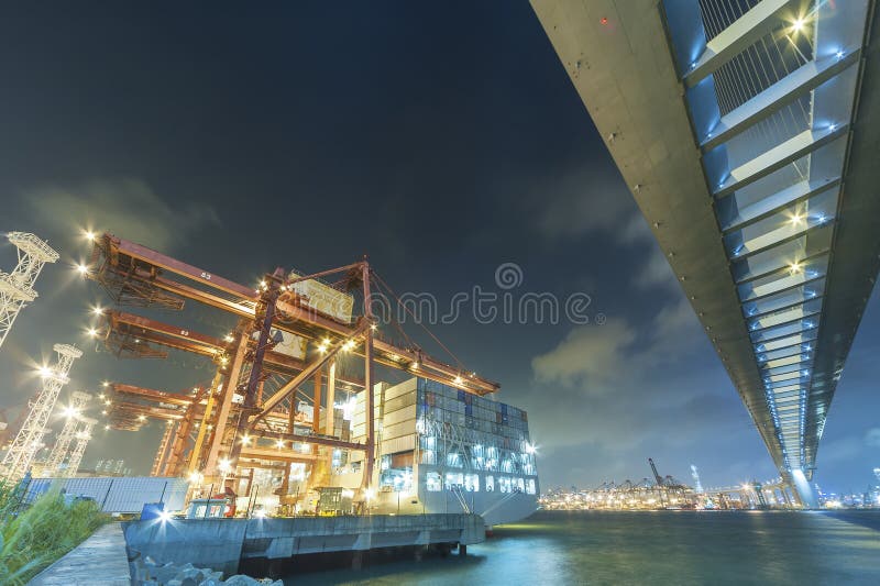 Cargo port and bridge stock photo. Image of night, import - 95812688