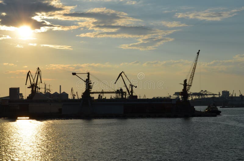 Cargo port dock at sunset stock photo. Image of pier - 66601562