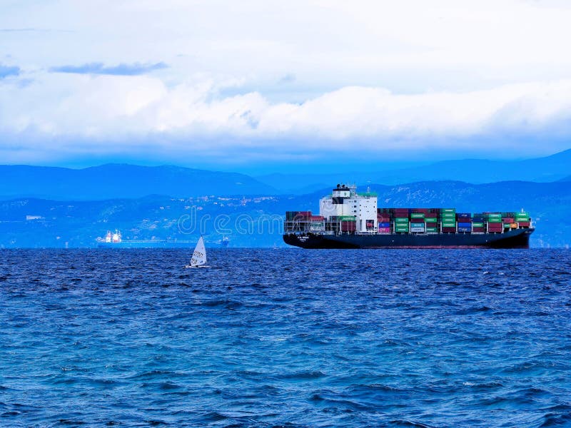 Cargo Ship with Containers in Deep Blue Sea Editorial Image - Image of ...