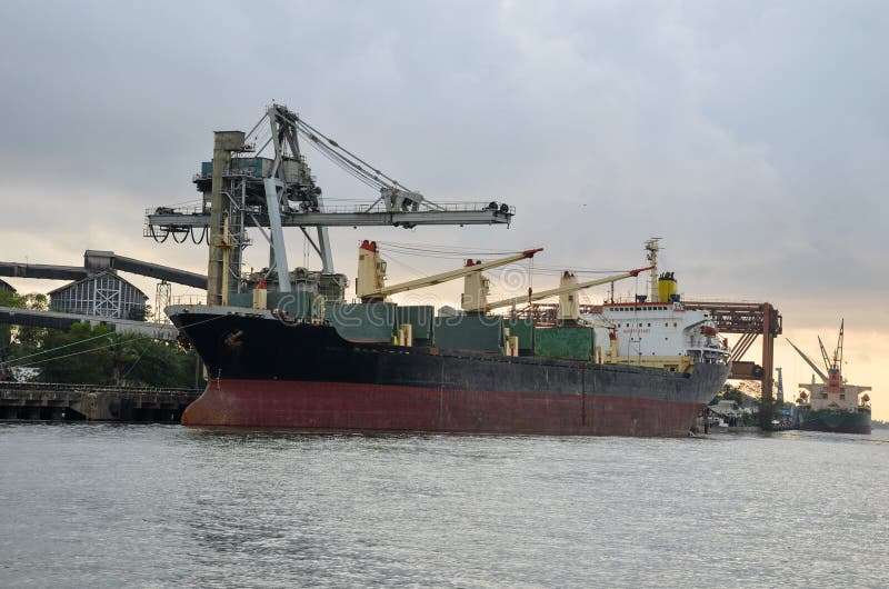 Cargo Ship Docked at a Port Stock Image - Image of carrier, freighter ...