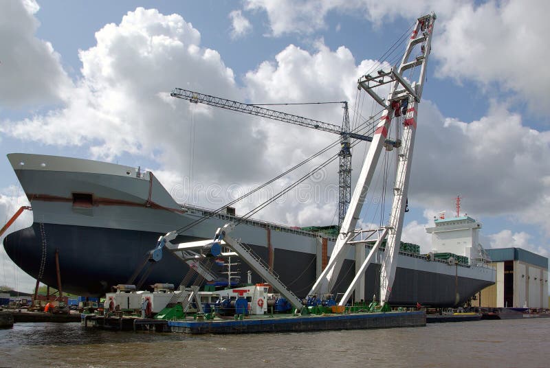Cargo ship on dry dock stock image. Image of coaster - 19225403