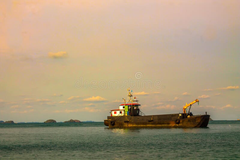 Cargo Ship floating. stock photo. Image of sunlight, ocean - 43717370