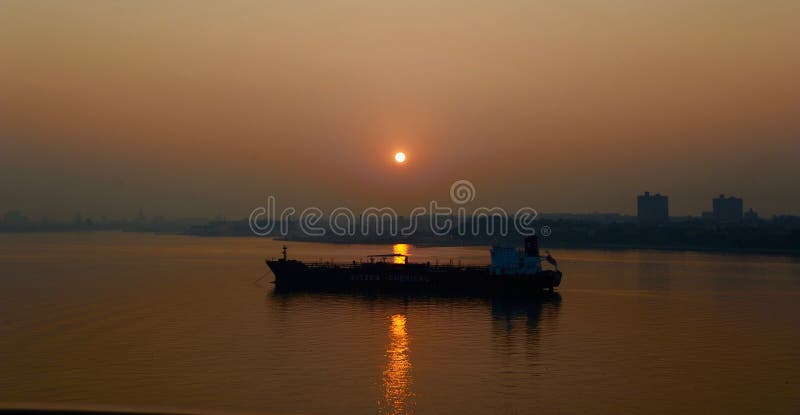 Cargo Ship Floating on Sunrise. Stock Image - Image of sunrise, ship ...