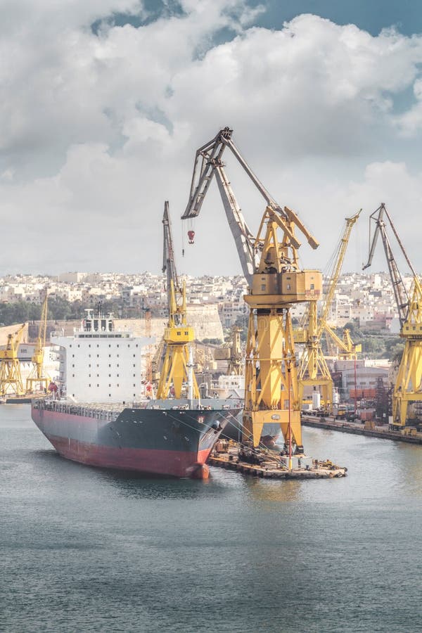 Cargo Ship in the Harbor, Valletta, Malta Stock Image - Image of ...