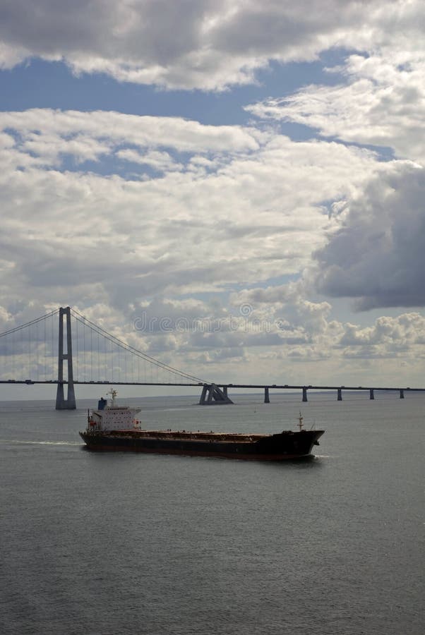 Cargo Ship, Having Just Passed Under A Bridge Stock Image - Image of ...