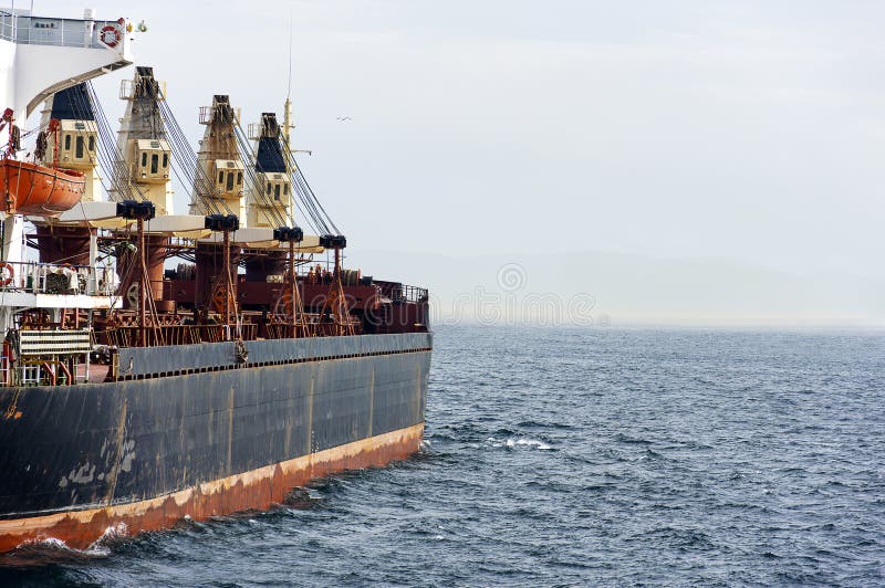 A Cargo Ship Heading for the Open Sea Stock Photo - Image of mode ...