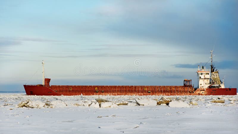 Cargo ship on the ice sea stock photo. Image of commercial - 29009328
