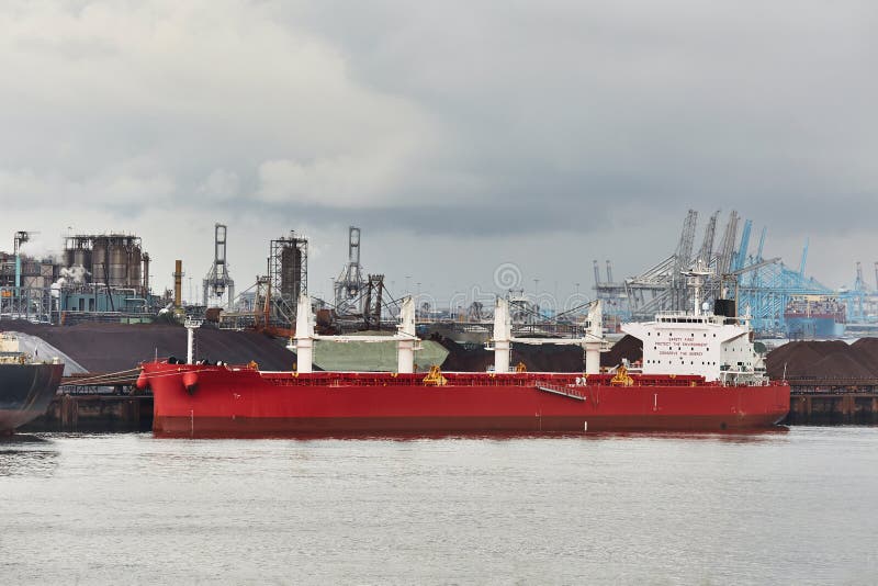 Industrial Harbor with Rusty Structures, Bulk Carrier Ship Stock Photo ...