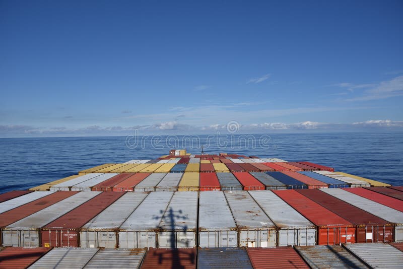 Cargo Ship Loaded with Colorful Containers Sailing through the Ocean ...