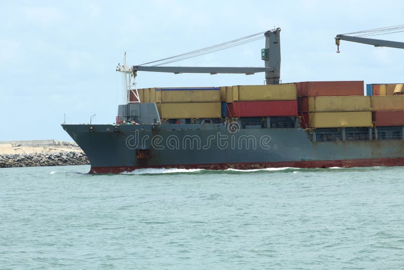 Cargo Ship Loaded with Containers in Sailing in an Inlet. Stock Photo ...