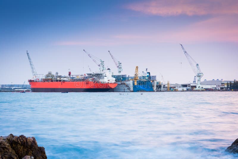 Cargo Ship Loading in Cargo Terminal Stock Photo - Image of maritime ...