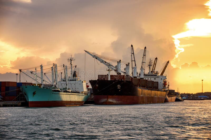 Cargo Ship Loading Containers at Sunshine Stock Image - Image of ...