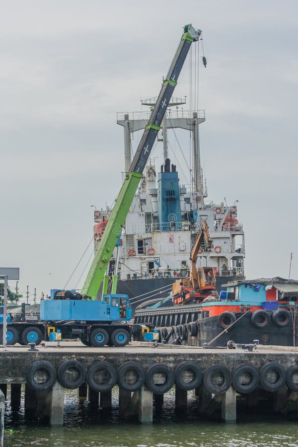 Cargo Ship Loading Crane in River. Stock Image - Image of large ...