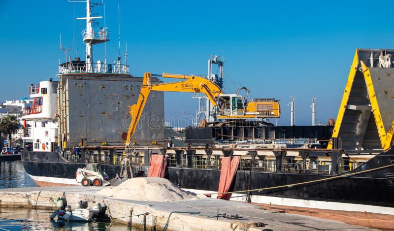 Cargo Ship Loading on a Dock on the Greek Isle of Paros Editorial Stock ...