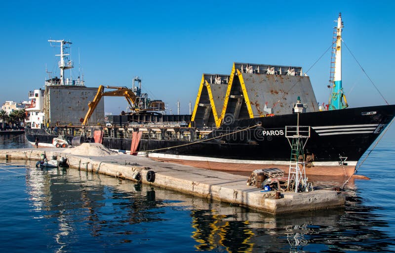 Cargo Ship Loading on a Dock on the Greek Isle of Paros Editorial Image ...
