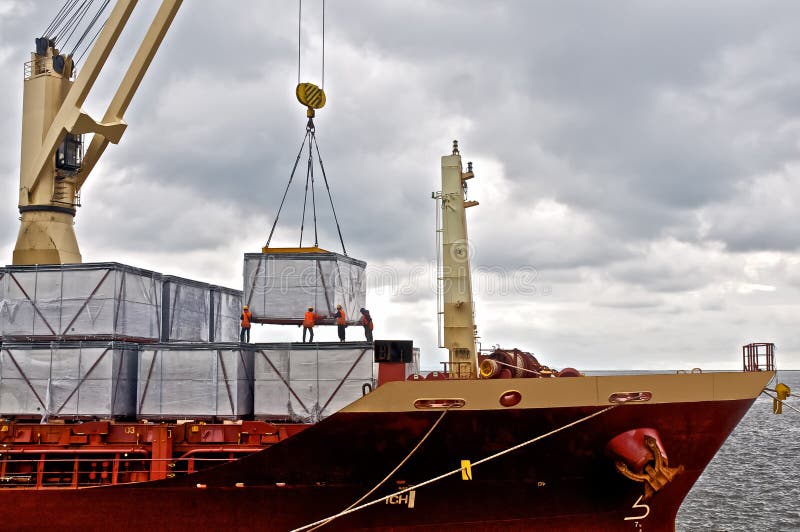 Cargo Ship Loading in Harbor Stock Photo - Image of objects, loading ...
