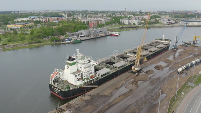 Cargo Ship Loading Multiple Shipping Containers from Semi Stock Footage ...