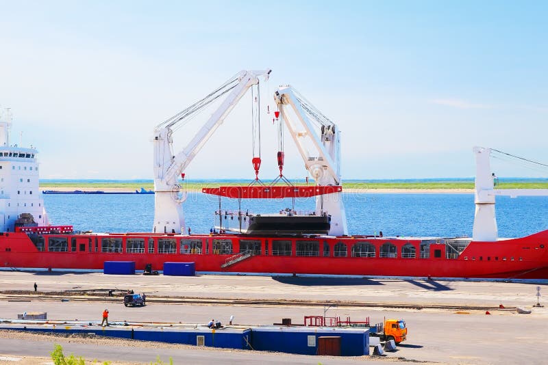 Cargo Ship Loading at the Port Stock Image - Image of long, horizontal ...