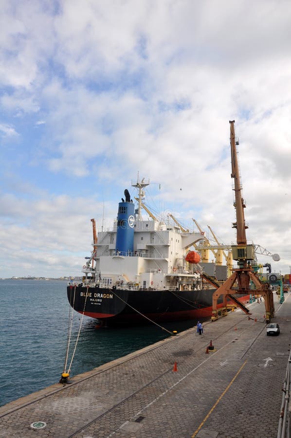 Cargo ship moored in port editorial photography. Image of marina ...