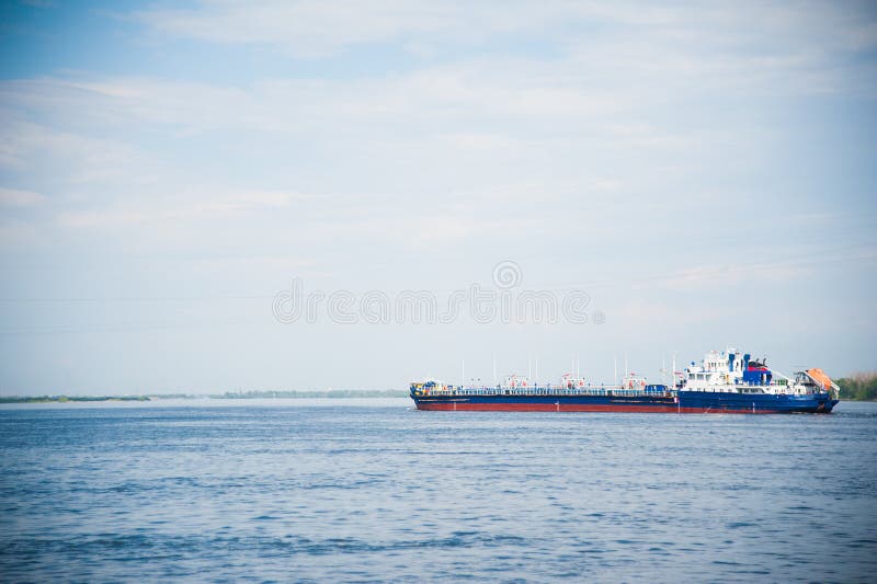 Cargo Ship Moving Along the River Stock Photo - Image of water, ship ...