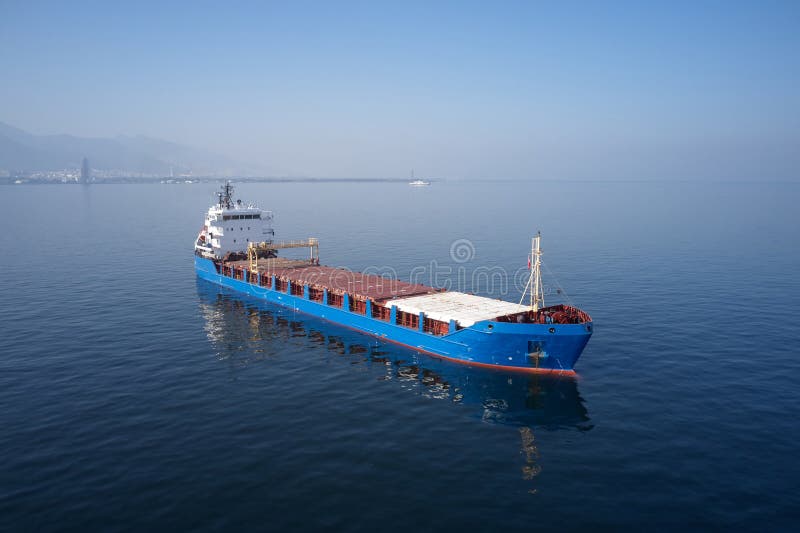 Cargo Ship Moving in Calm Sea. View of Blue Sea. Stock Photo - Image of ...