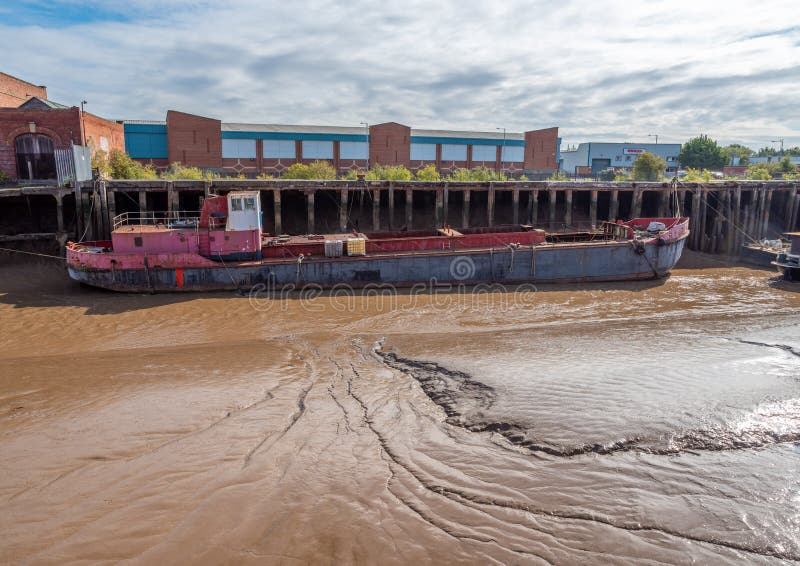 Cargo Ship on Mud at Low Tide Editorial Stock Photo - Image of marine ...