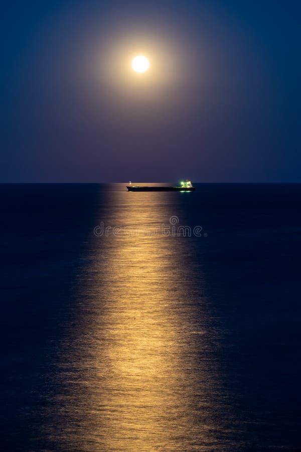 Cargo ship at night stock image. Image of dark, freighter - 197017291