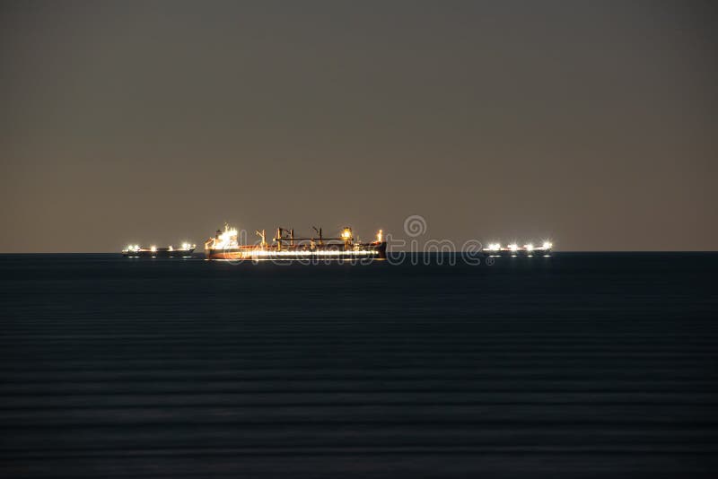 Cargo ship at night stock image. Image of dark, freighter - 197017291