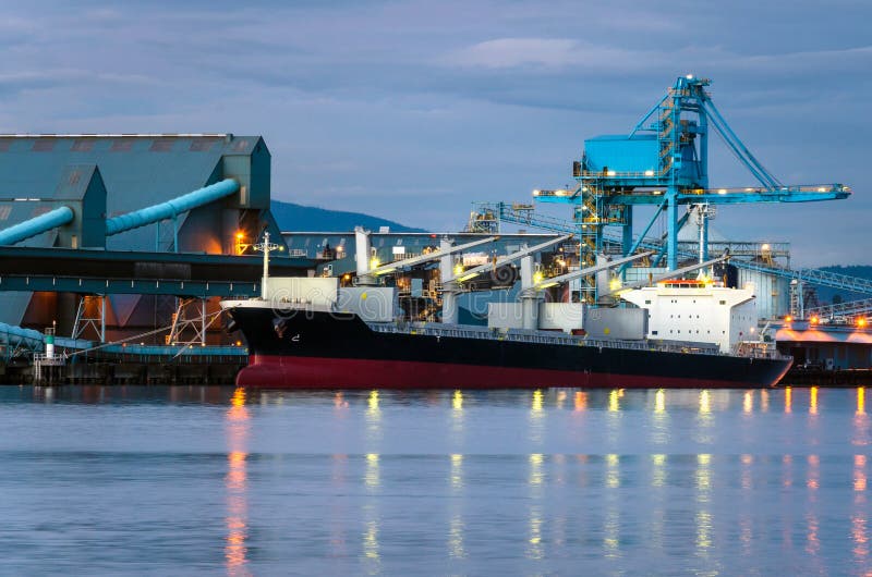 Cargo Ship at Night stock image. Image of lights, colourful - 65792207
