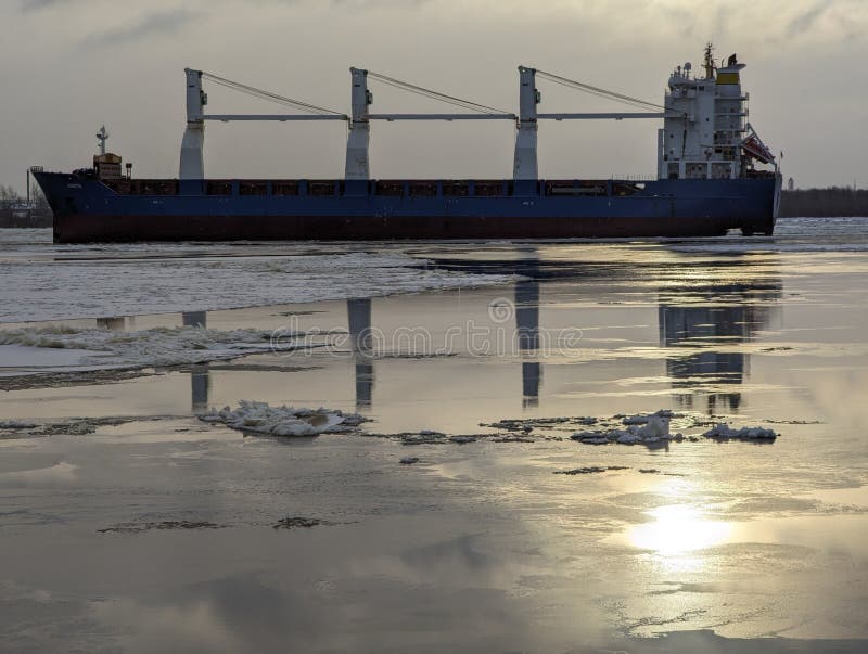 Cargo Ship, Ice Classed Bulk Carrier in the Ice and Fog of a Freezing ...