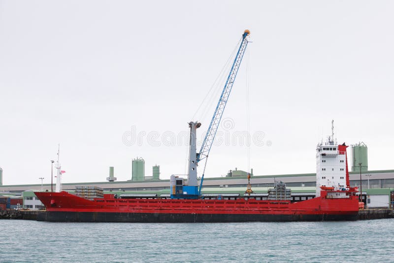 Cargo Ship with Red Hull is Loading in Port Stock Image - Image of boat ...
