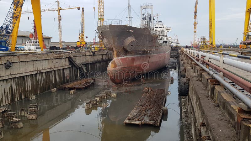 Cargo ship repair stock photo. Image of ship, watercraft - 262327420