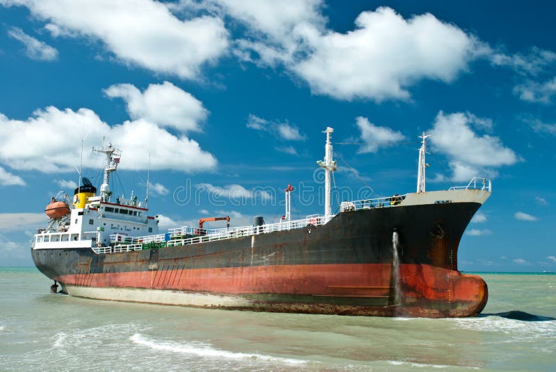 Cargo Ship Run Aground on Rocky Shore Stock Image - Image of boat ...