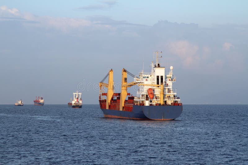 Container Ship With Deck Cargo Load Sailing At Sea Stock Image - Image ...