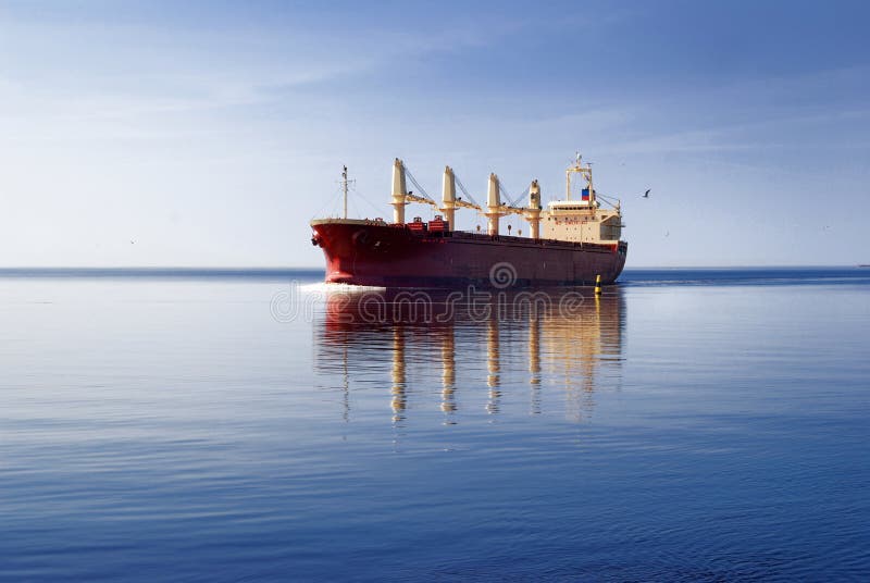 Cargo Ship Sailing in Still Water Stock Image - Image of dock ...