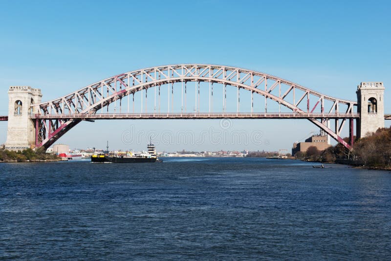 Cargo Ship Sails Under a Bridge Stock Photo - Image of shipping, bridge ...