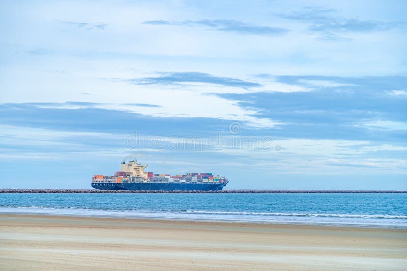 Cargo Ship at the Sandy Beach Stock Image - Image of container ...