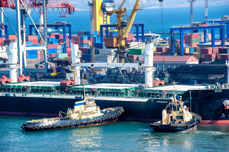Cargo Ship and Tug Boat in Port Stock Image - Image of logistic ...