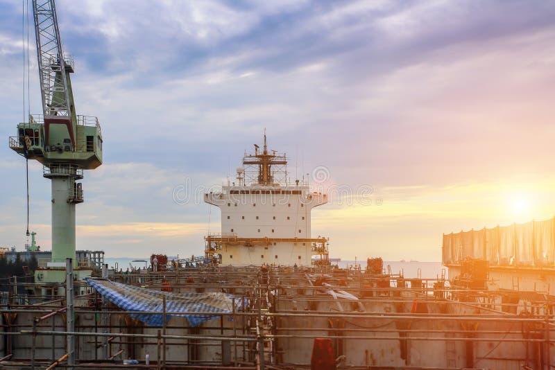 Ship repair in shipyard stock image. Image of floating - 155224933