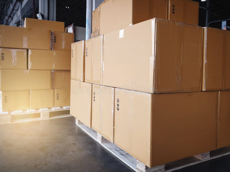 Cargo Shipment Boxes. Stack of Cardboard Boxes on Pallet Rack at the ...