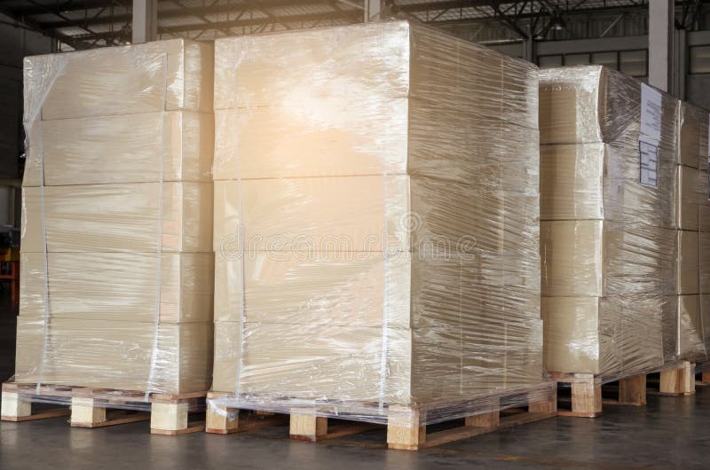 Cargo Shipment Boxes. Stack of Package Boxes Wrapping Plastic Film on ...