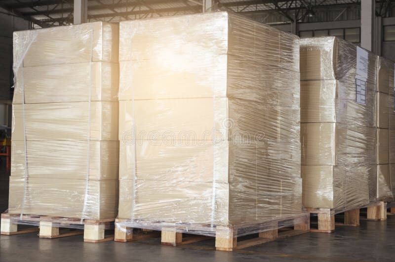 Cargo Shipment Boxes. Stack of Package Boxes Wrapping Plastic Film on ...