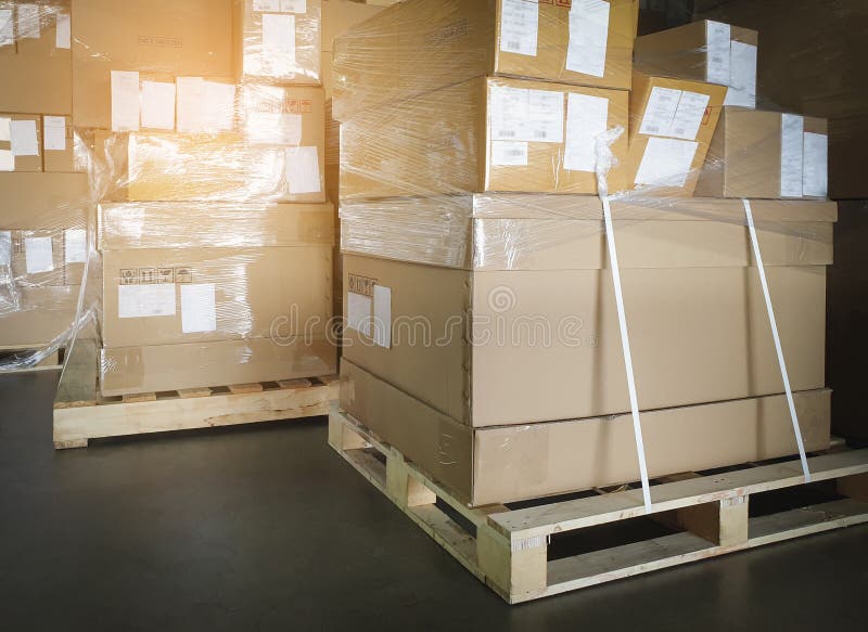 Cargo Shipment Boxes. Stacked of Package Boxes on Pallet Rack at the ...