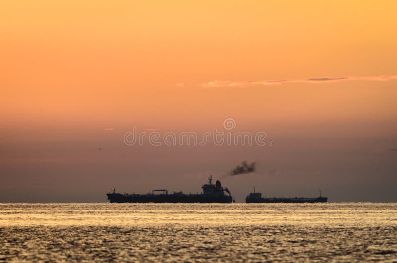 Cargo ships at anchor stock photo. Image of ocean, seawater - 77386860