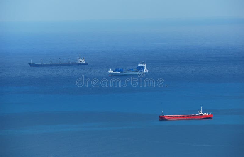 Cargo ships in blue sea stock image. Image of view, barge - 19762047