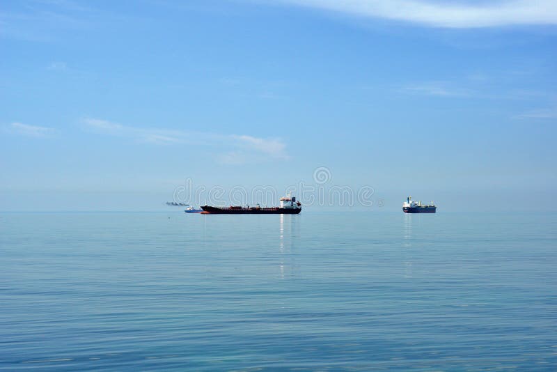 Cargo Ships in the Clear Blue Sea. Stock Photo - Image of boating ...