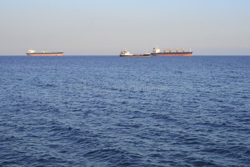 Cargo Ships on the Horizon. Stock Image - Image of industry, shipping ...