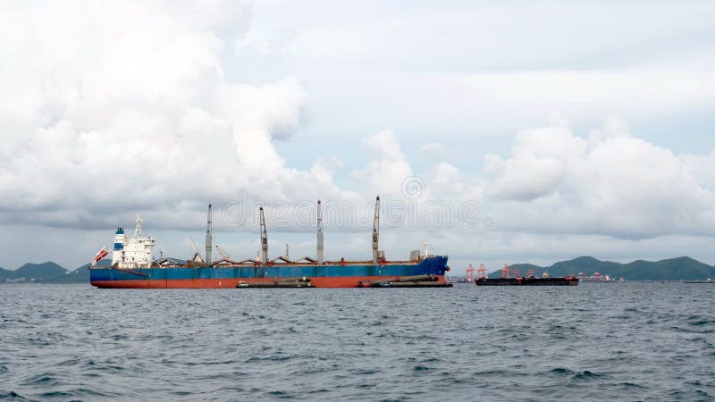 Cargo Ships Moored for Loading and Unloading at Sea Stock Image - Image ...