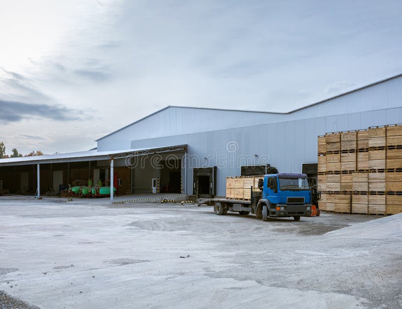 Cargo Terminal of the Logistics Center. the Truck in Which the Boxes ...