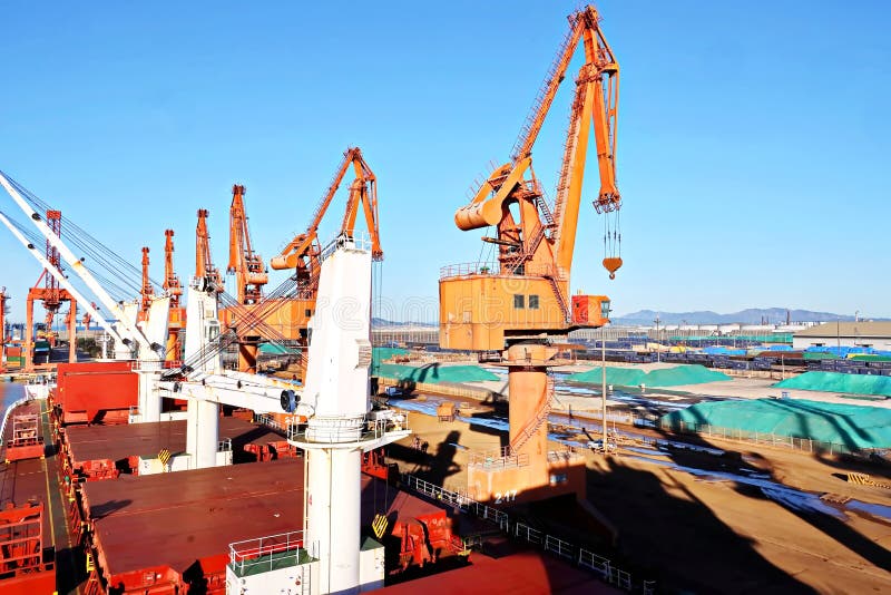 Cargo Terminal for Unloading Bulk Cargoes by Shore Cranes. Views of the ...